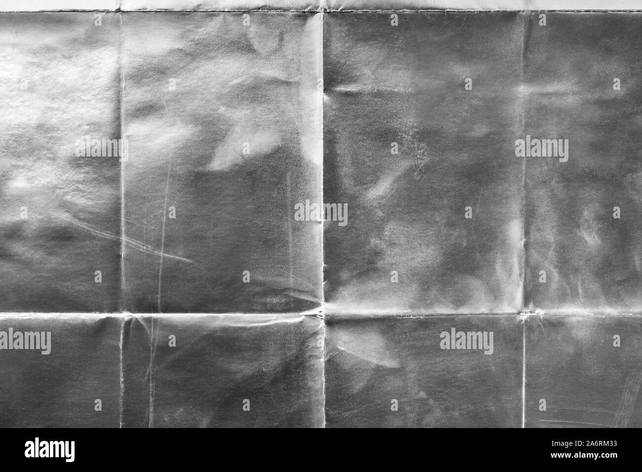 Silver wrapping paper with scratches and folds, texture background ...
