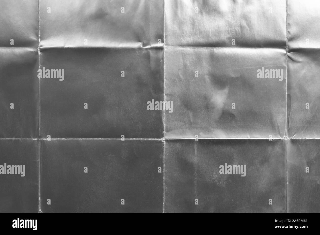 Silver wrapping paper with scratches and folds, texture background ...