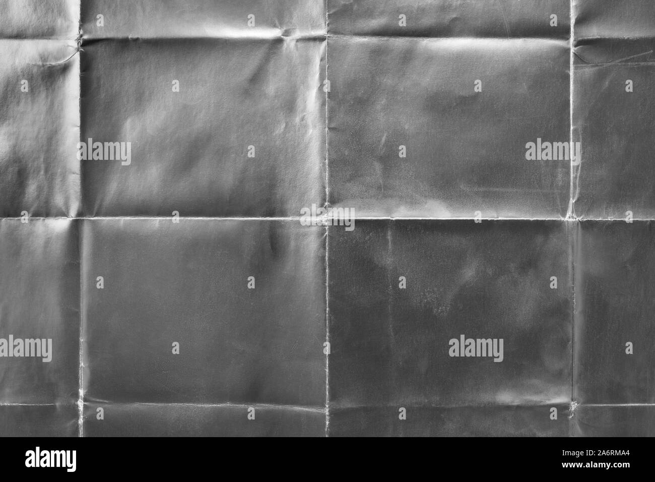 Silver wrapping paper with scratches and folds, texture background ...