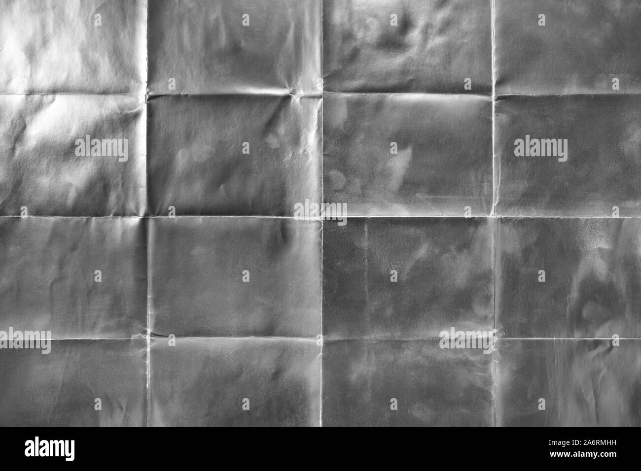 Silver wrapping paper with scratches and folds, texture background ...