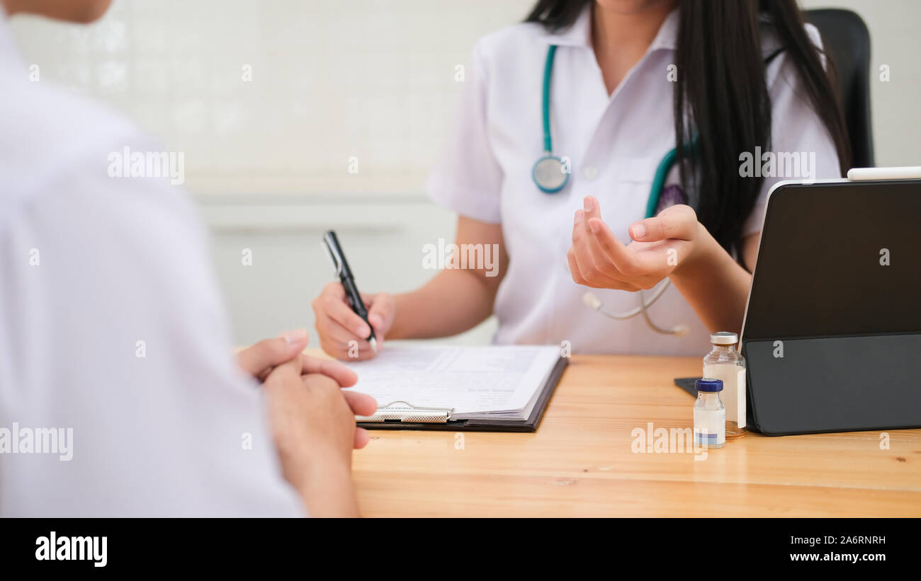 Close-up professional doctor giving medical advice to patient. Madical ...