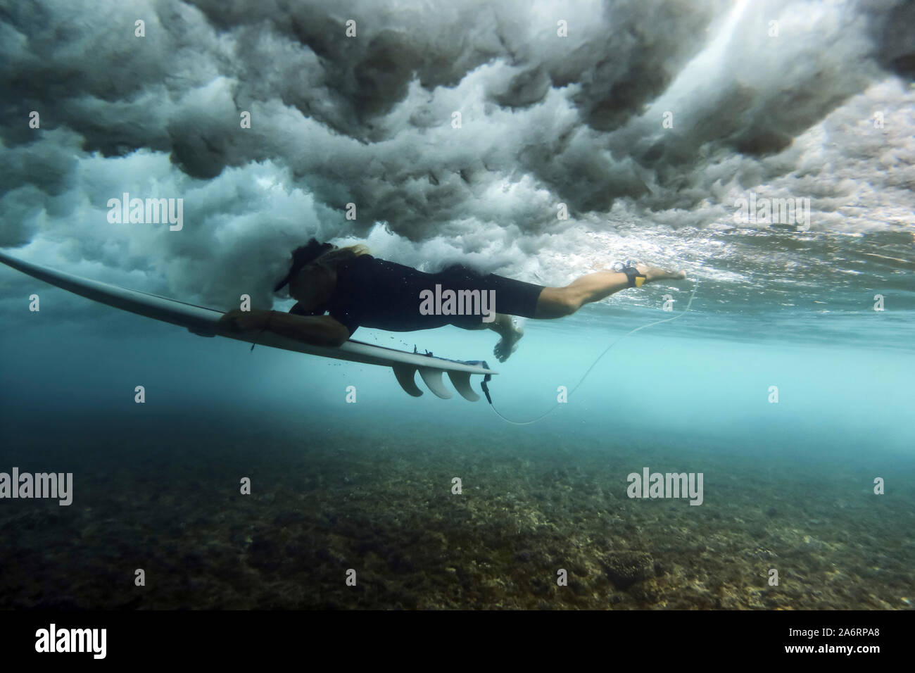 Underwater view of surfer Stock Photo - Alamy