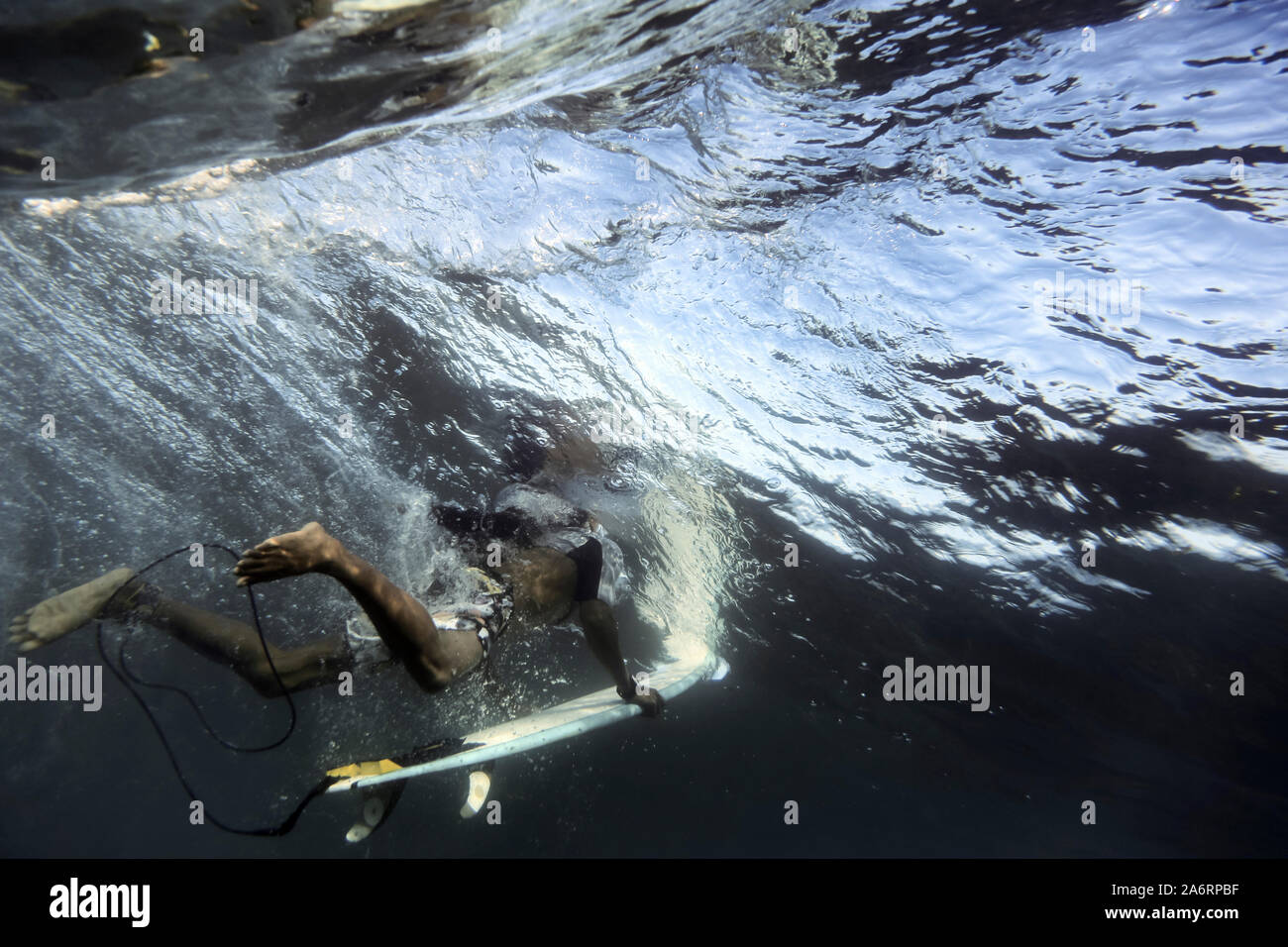 Underwater view of surfer Stock Photo - Alamy