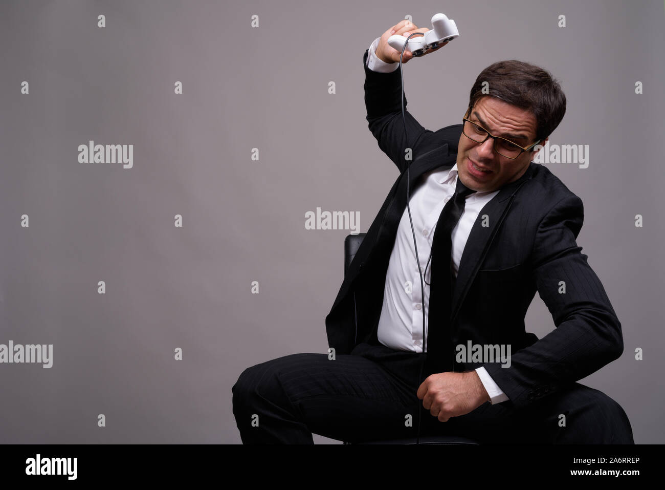 Man throwing chair hi-res stock photography and images - Alamy