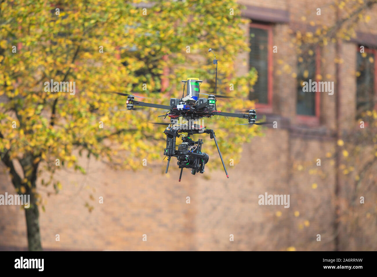 A high specification movie drone during filming in Cardiff city centre ...