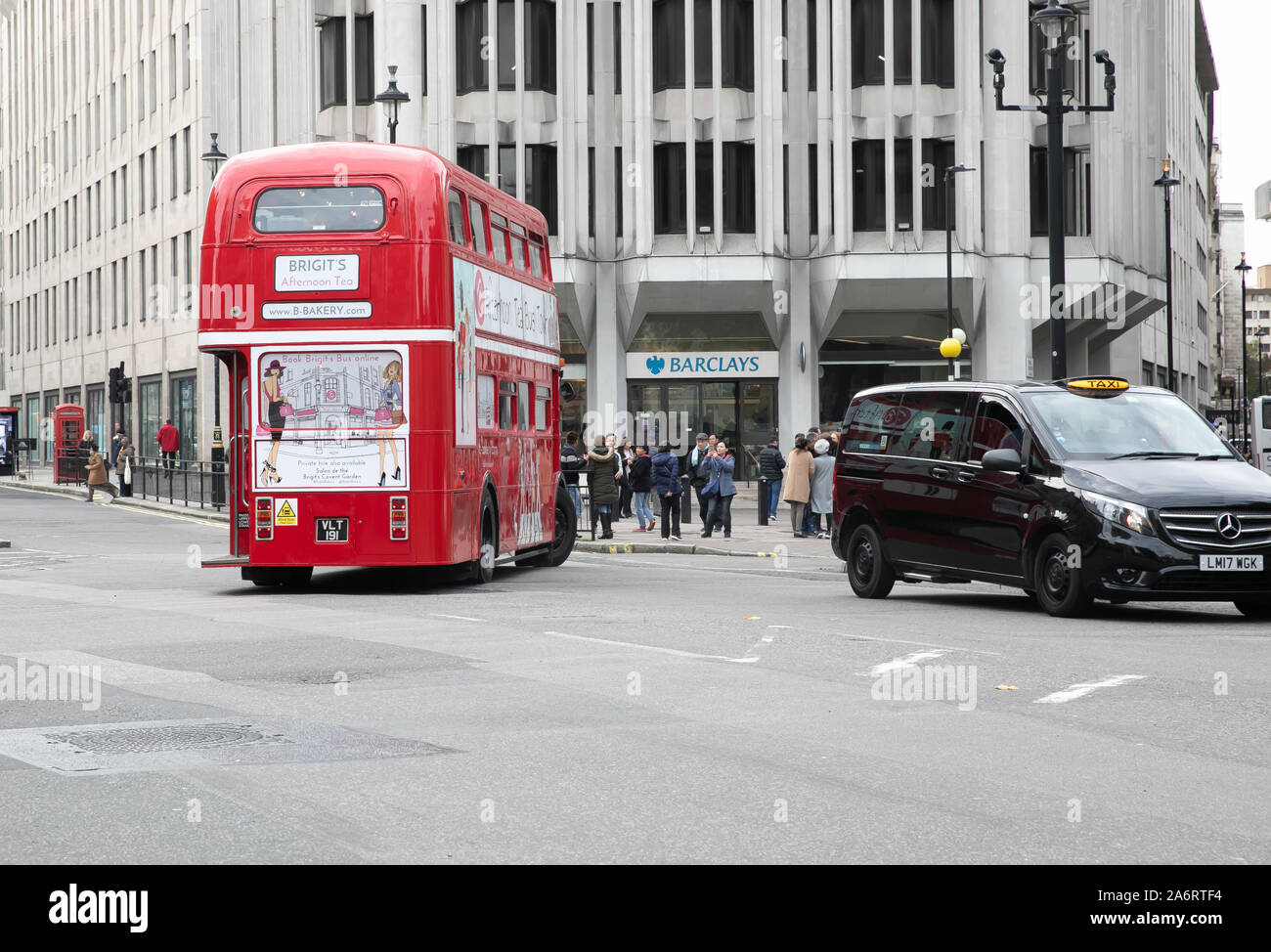 Red London Routemaster bus in Victoria street, London, UK Stock Photo ...
