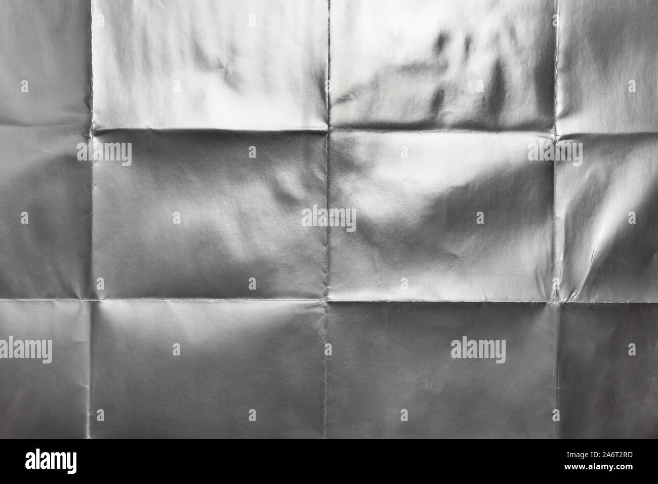 Silver wrapping paper with scratches and folds, texture background ...
