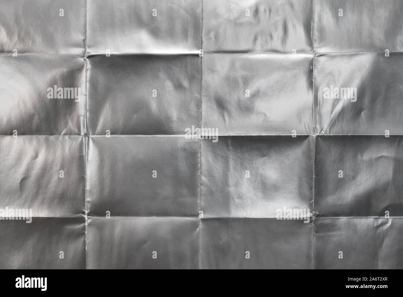 Silver wrapping paper with scratches and folds, texture background ...