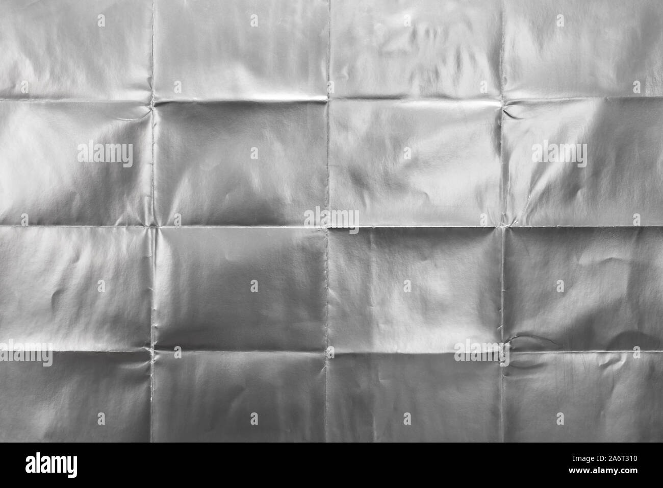 Silver wrapping paper with scratches and folds, texture background ...