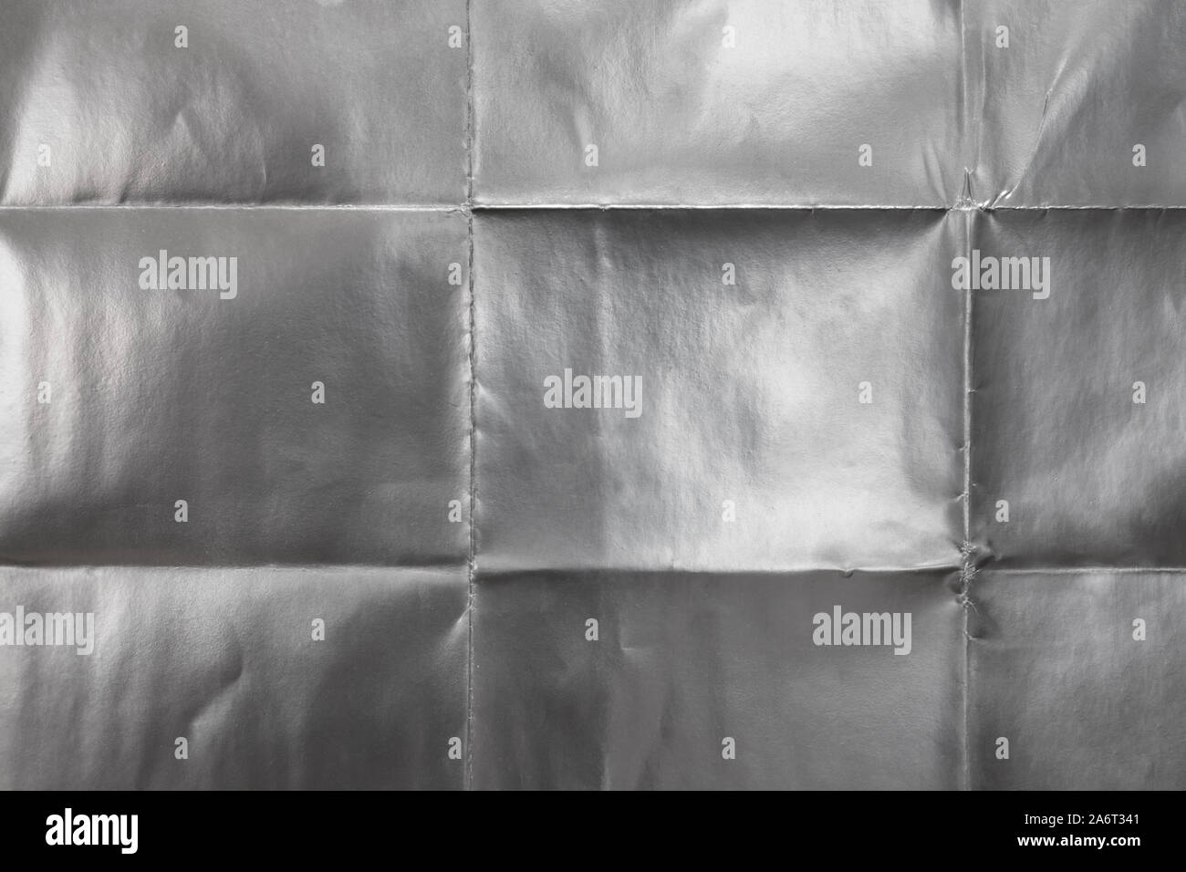 Silver wrapping paper with scratches and folds, texture background ...