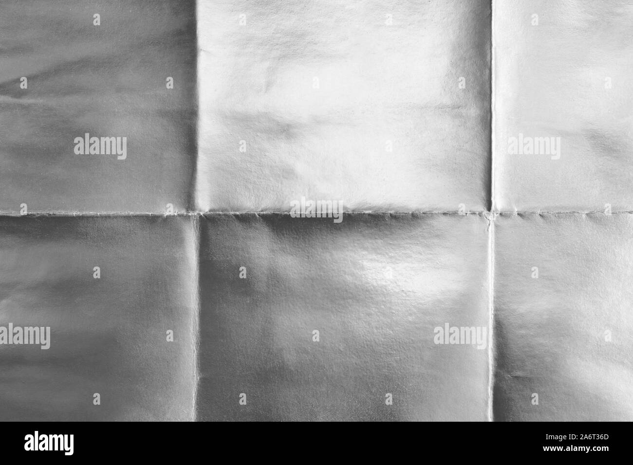 Silver wrapping paper with scratches and folds, texture background ...