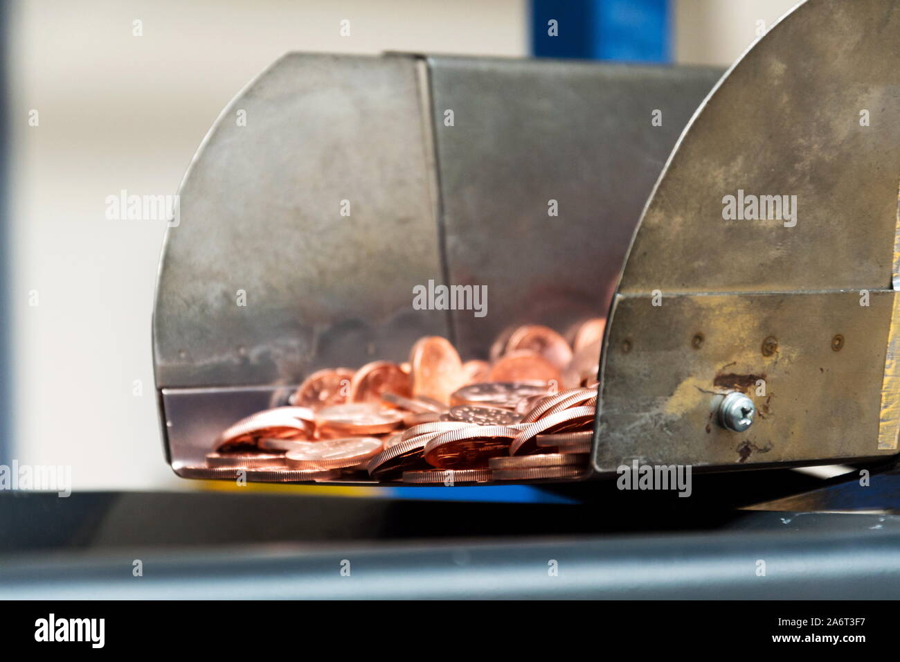 Coins manufactured and packed in money mint machine, steel galvanized ...