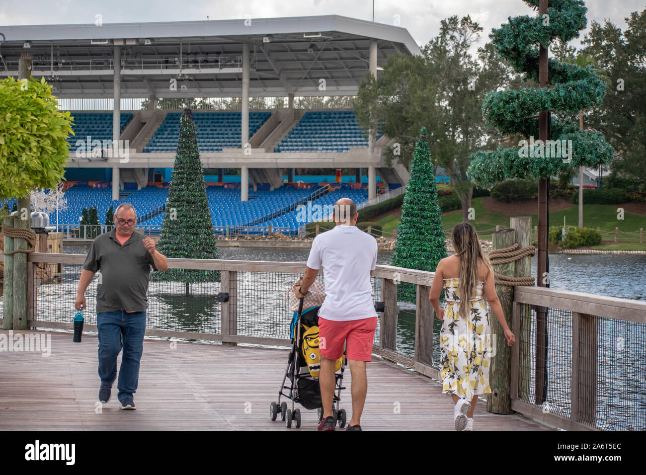 Orlando, Florida. October 24, 2019. Family walking on Seven Seas lake ...
