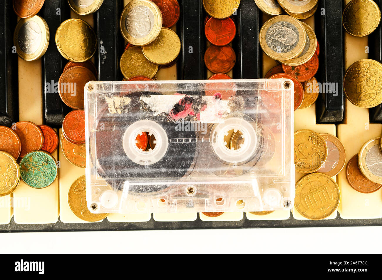 Photo picture close-up of piano keys keyboard and musicassette tape ...