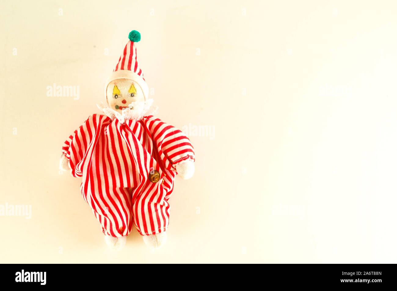 Photo of Pierrot toy doll on white background Stock Photo - Alamy