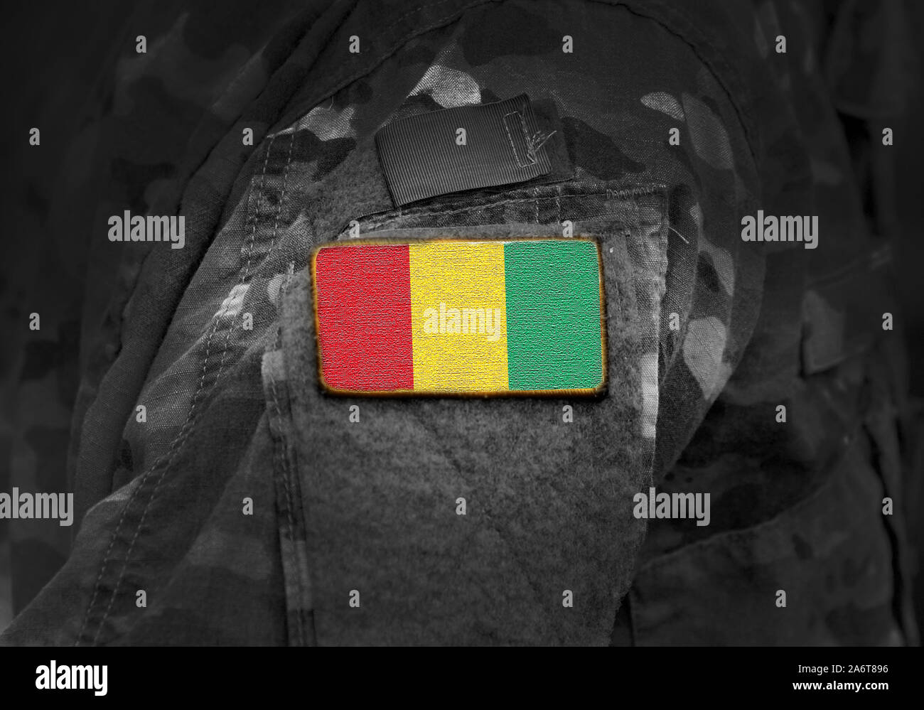 Flag of the Republic of Guinea on military uniform. Army, troops ...