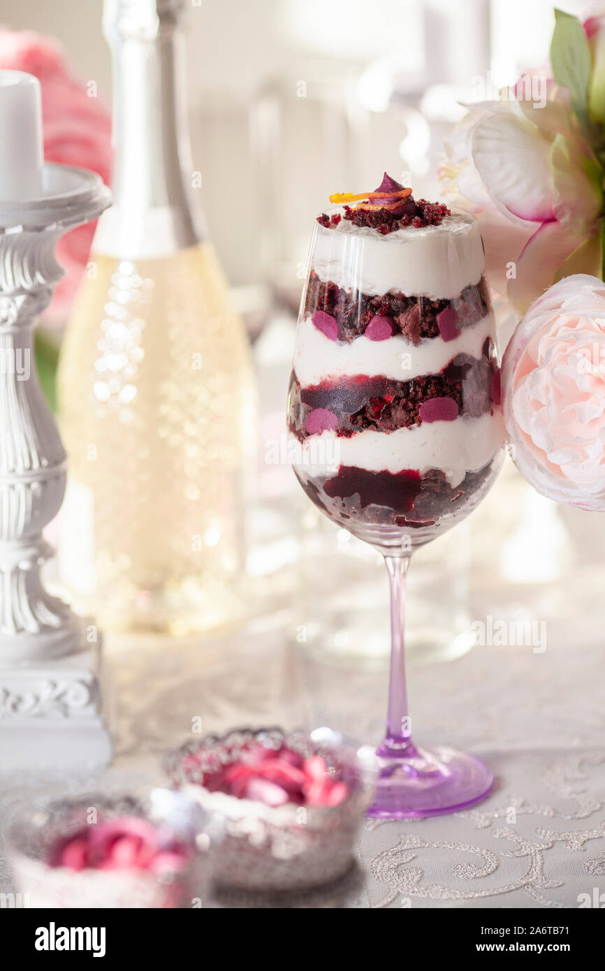 A traditional latvian layered rye bread dessert served in wine glass ...