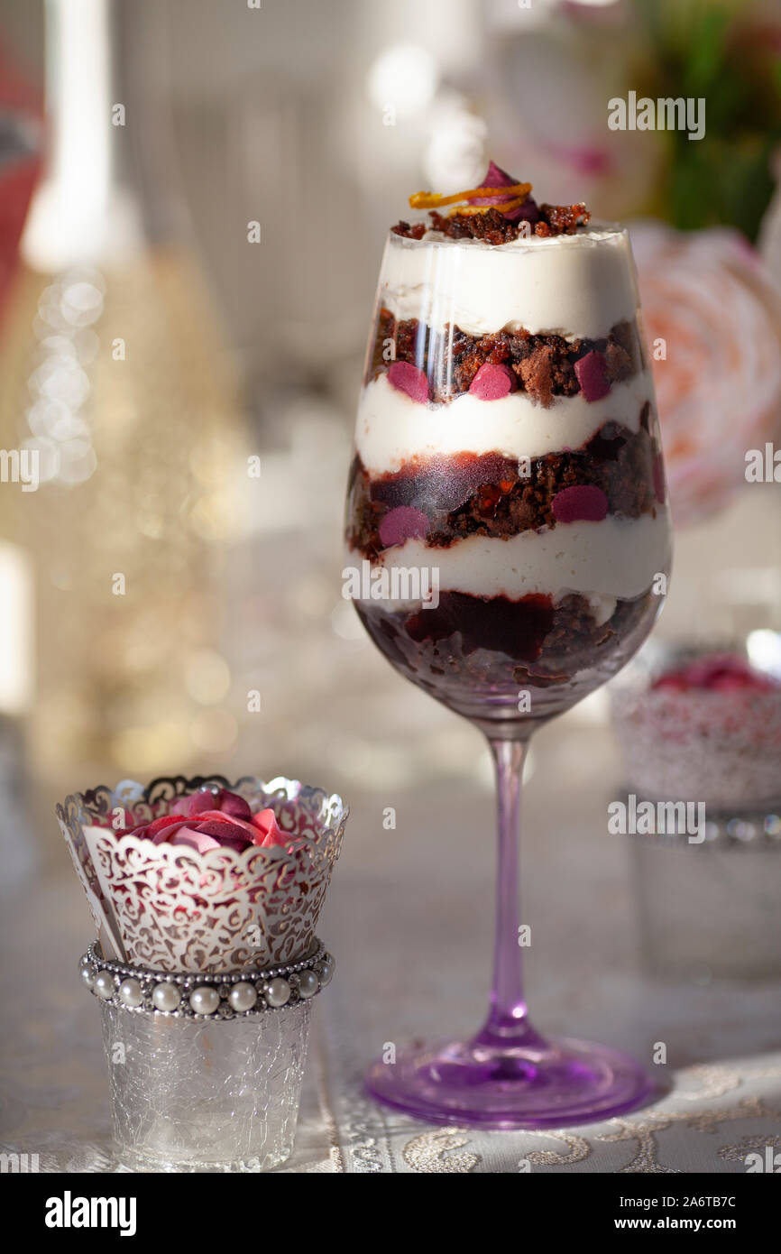 A traditional latvian layered rye bread dessert served in wine glass ...