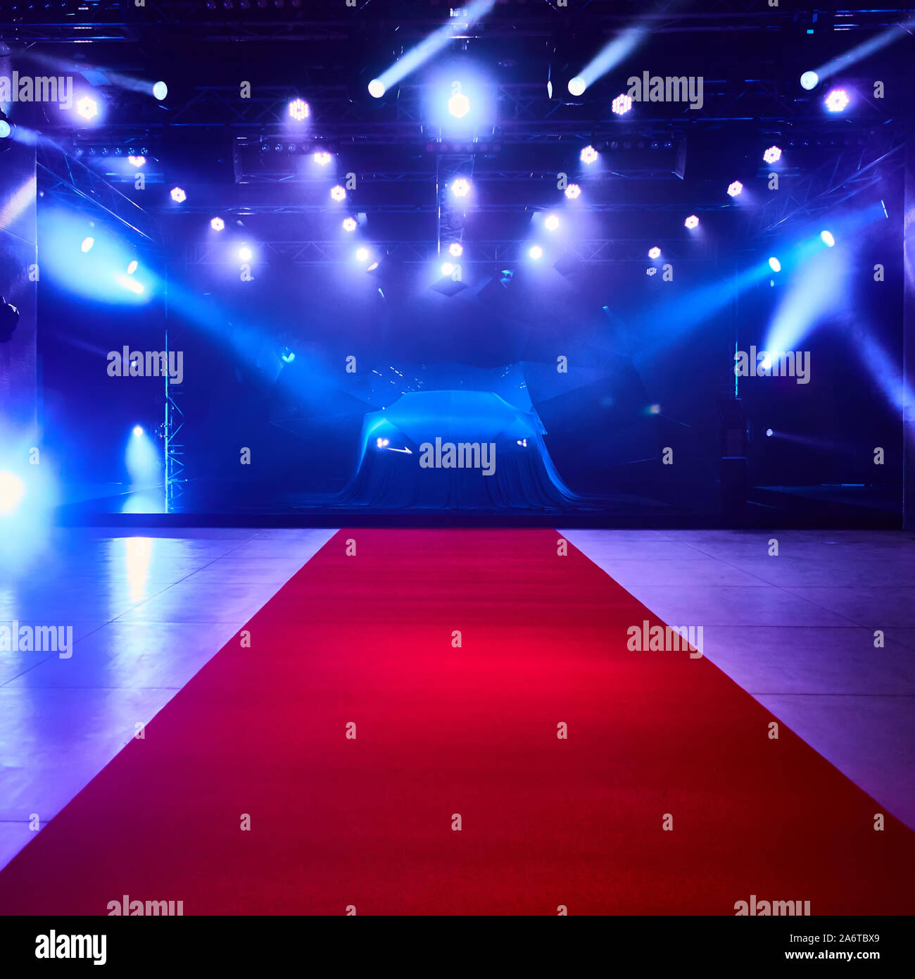 Close up of a new car hidden under cover Stock Photo - Alamy