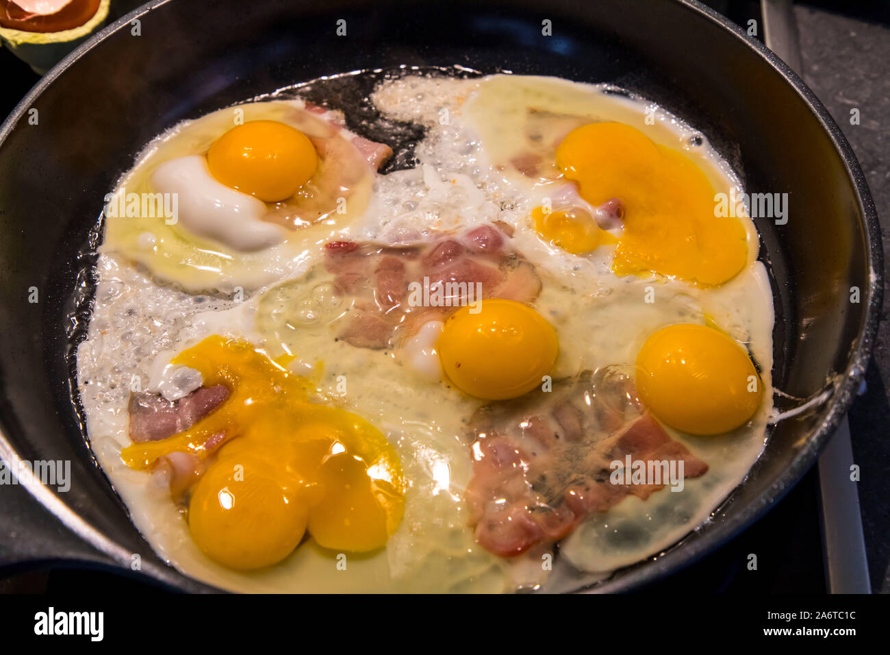 Fried eggs and ham, bacon, fry in a pan, Germany Stock Photo - Alamy