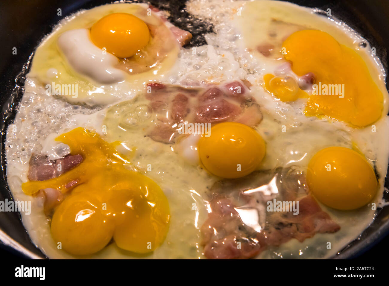 Fried eggs and ham, bacon, fry in a pan, Germany Stock Photo - Alamy