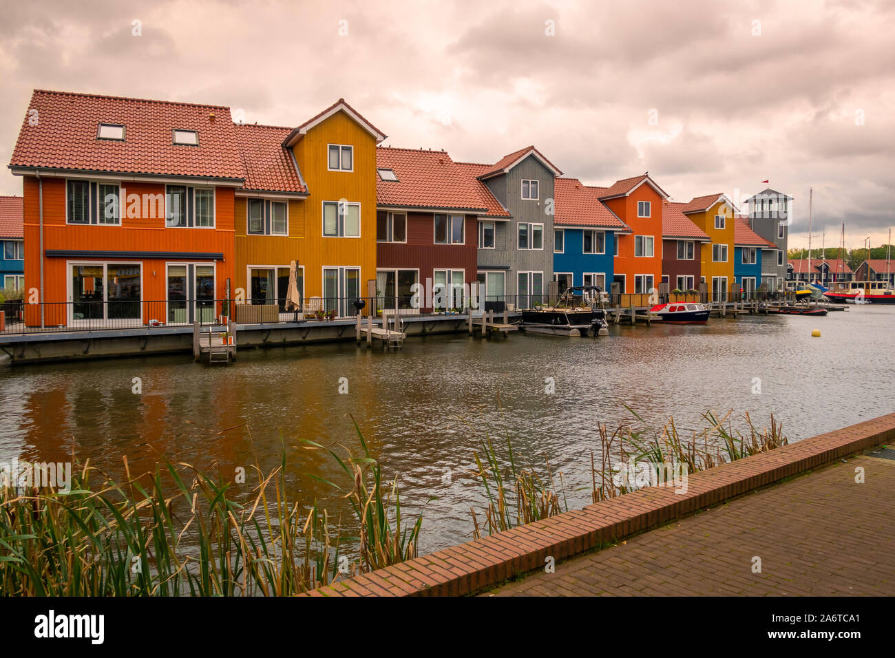 Colorful houses reitdiephaven harbor hi-res stock photography and ...