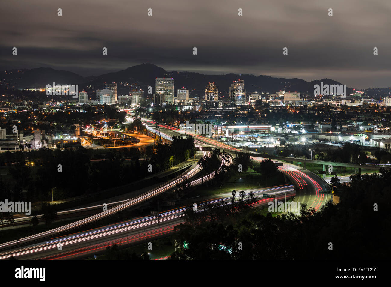 Night cityscape view of traffic on the 5 and 134 freeway interchange ...