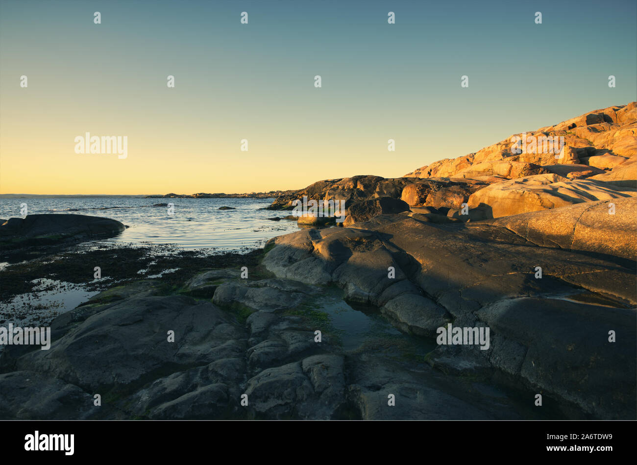 Rocky coast at sunset, Verdens Ende (Worlds End), Tjøme, Norway Stock ...