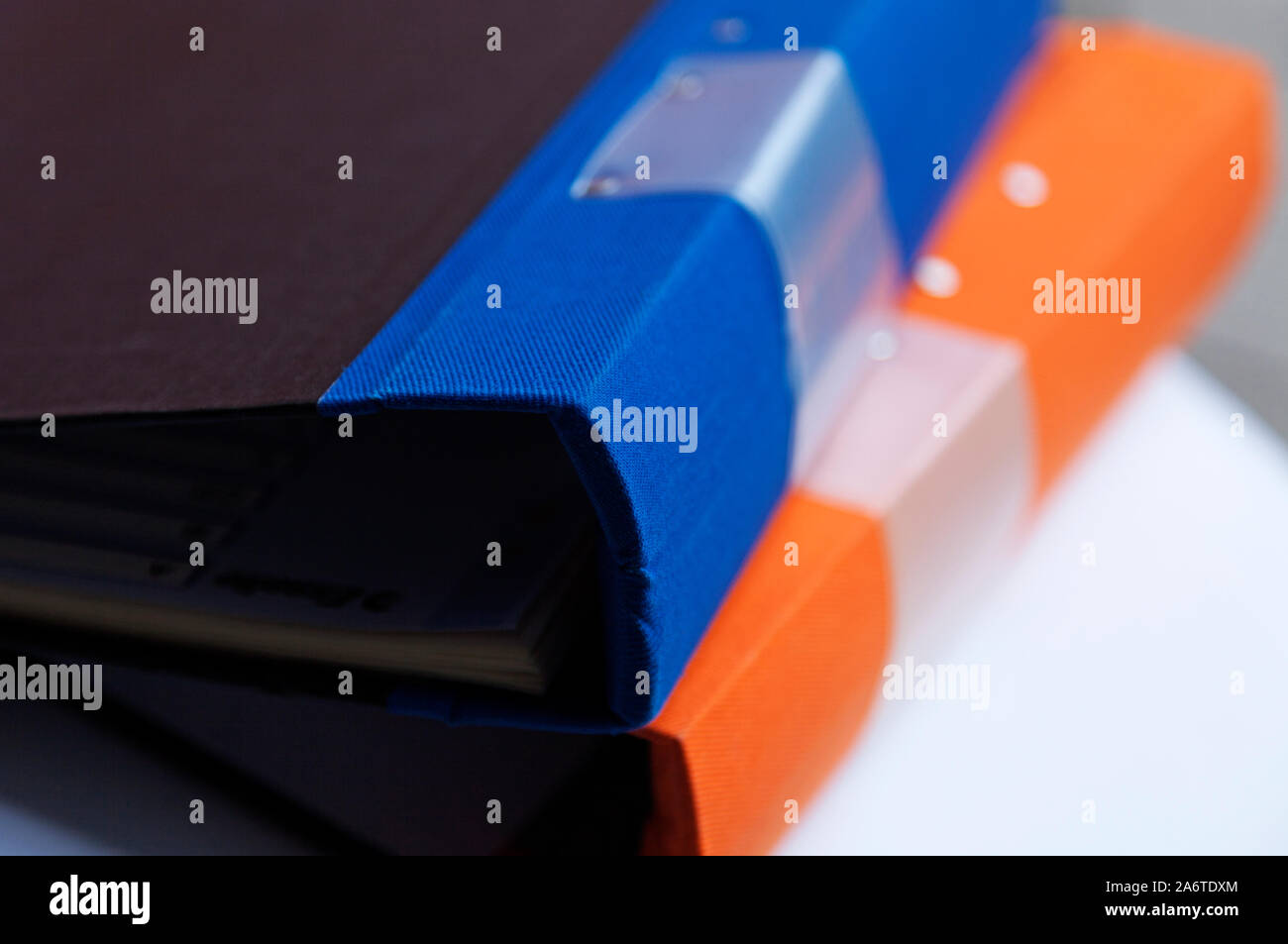 two binders lying on the office table Stock Photo - Alamy