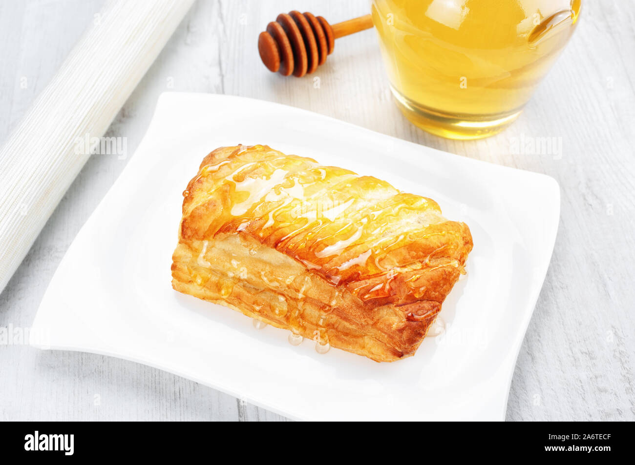 Puff pastry with honey Stock Photo - Alamy
