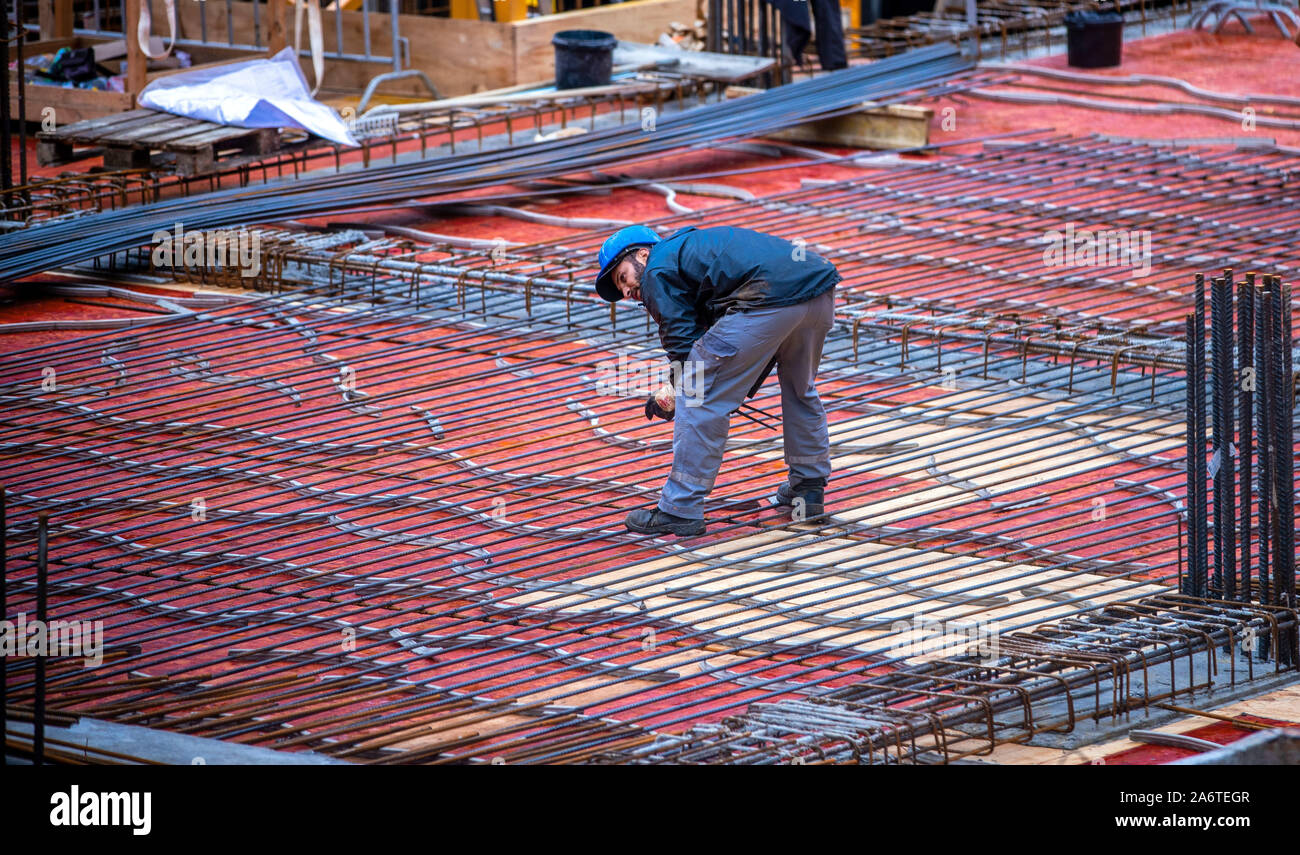 Dresden, Germany. 16th Oct, 2019. A construction worker laying ...