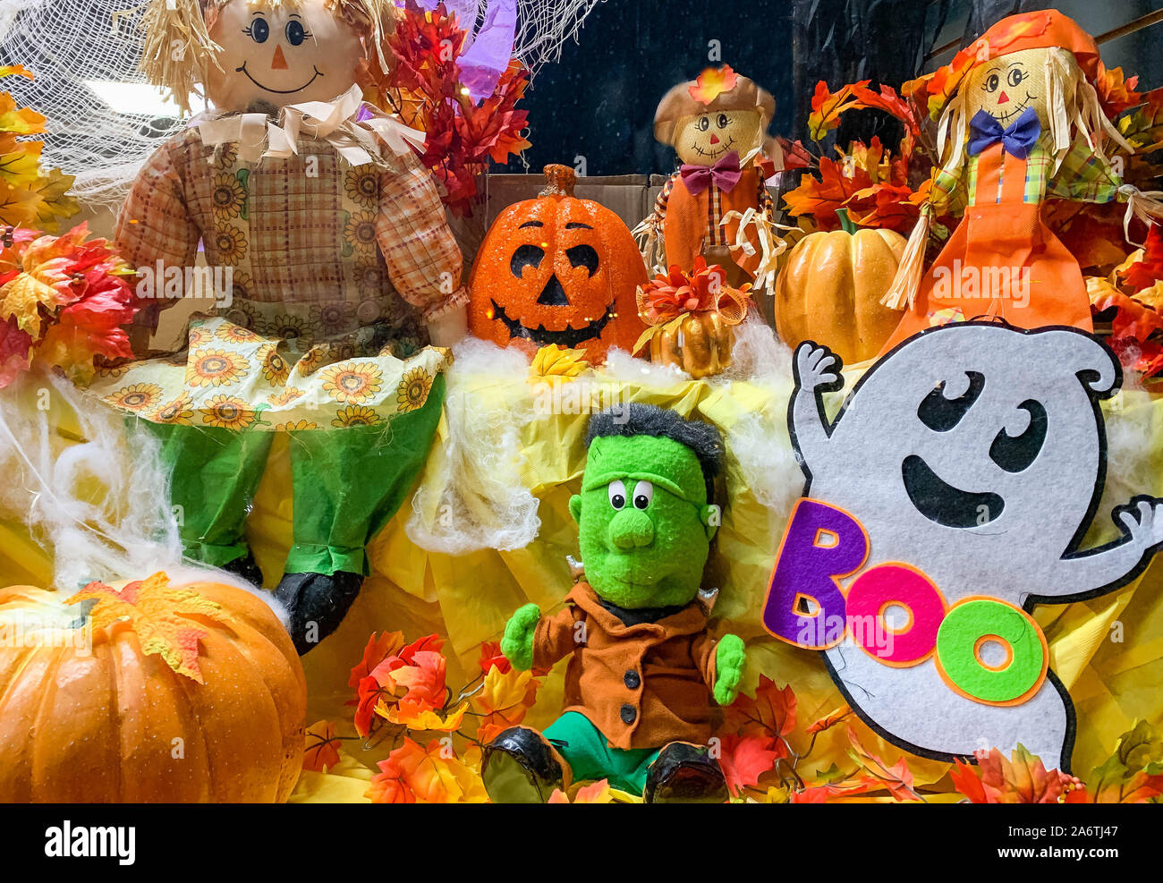Halloween screen decorations with dolls and pumpkins fall harvest setup ...