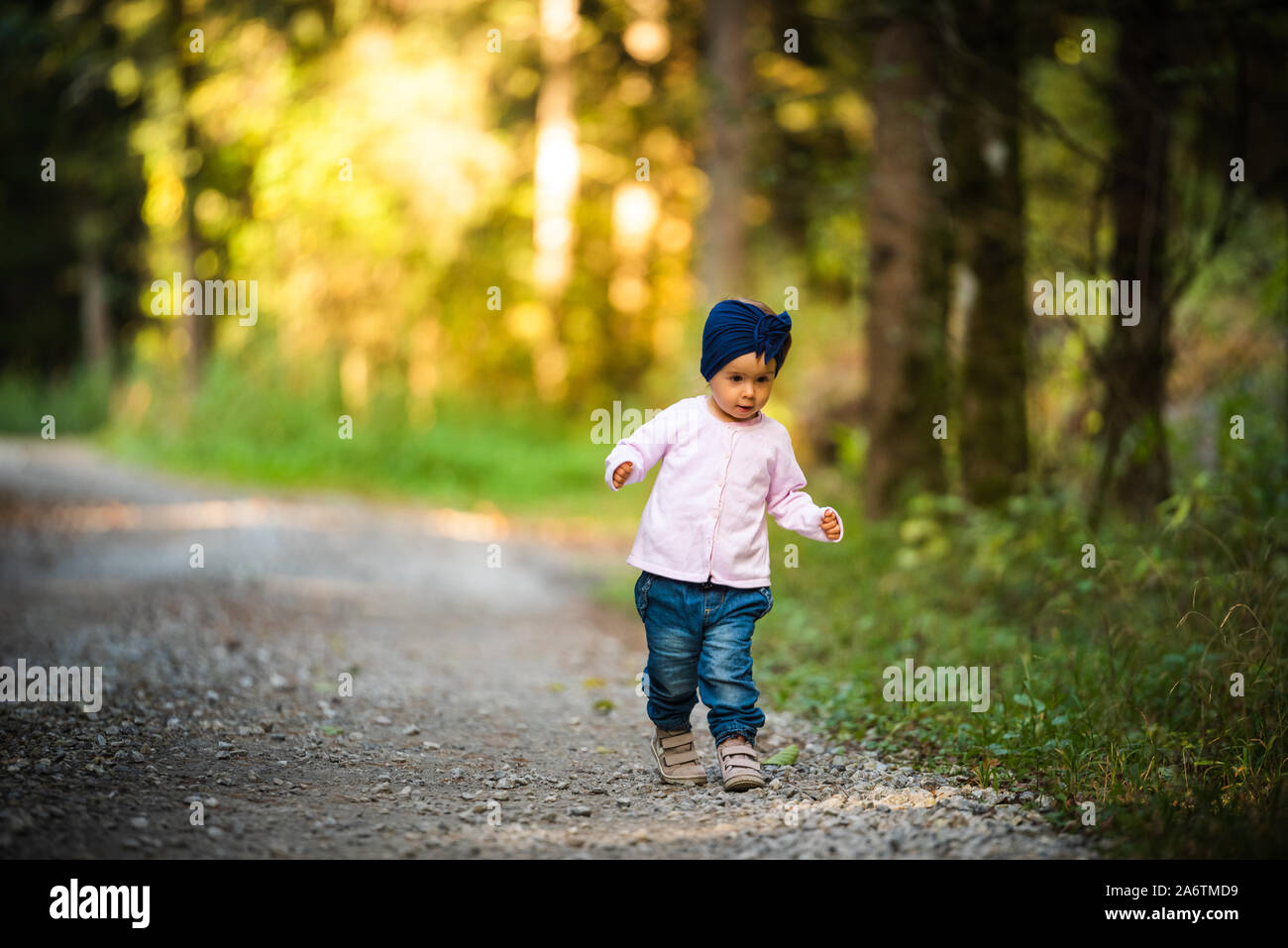 Baby walking alone hi-res stock photography and images - Alamy