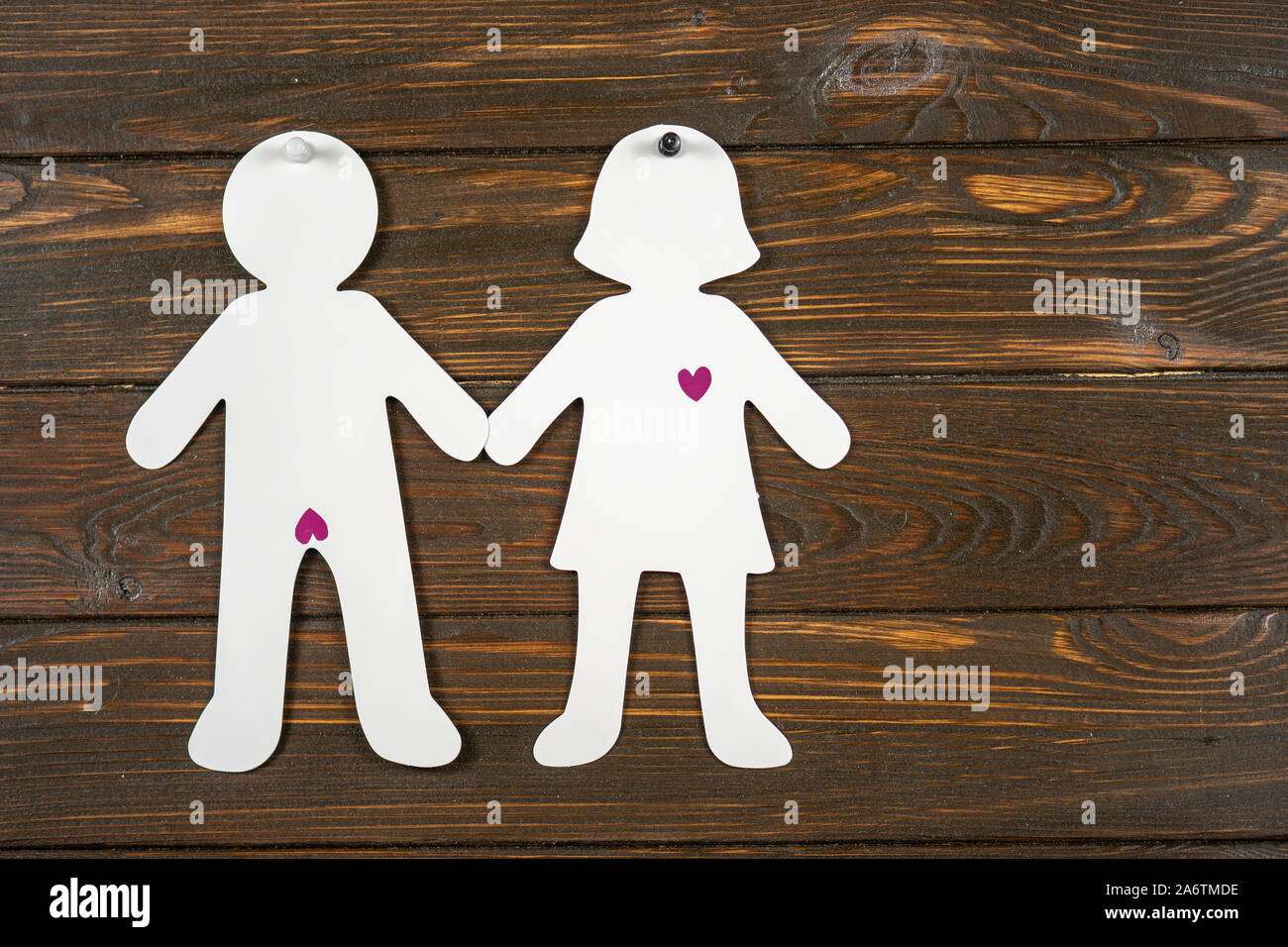 Large paper people shapes.Love concept Stock Photo - Alamy