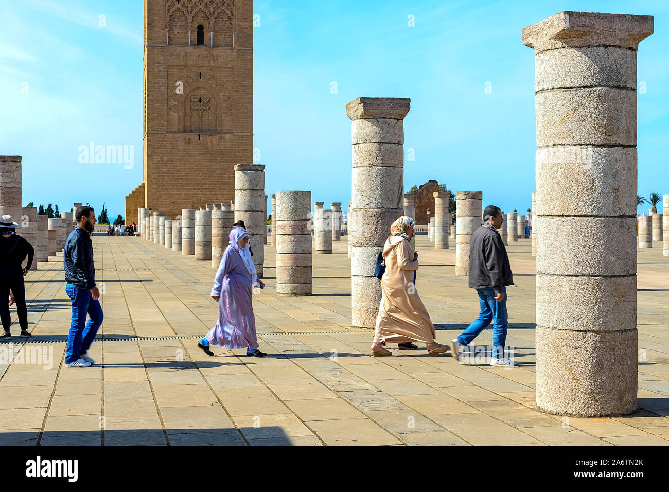 View of the square with ruins and the Hassan tower against the blue sky ...