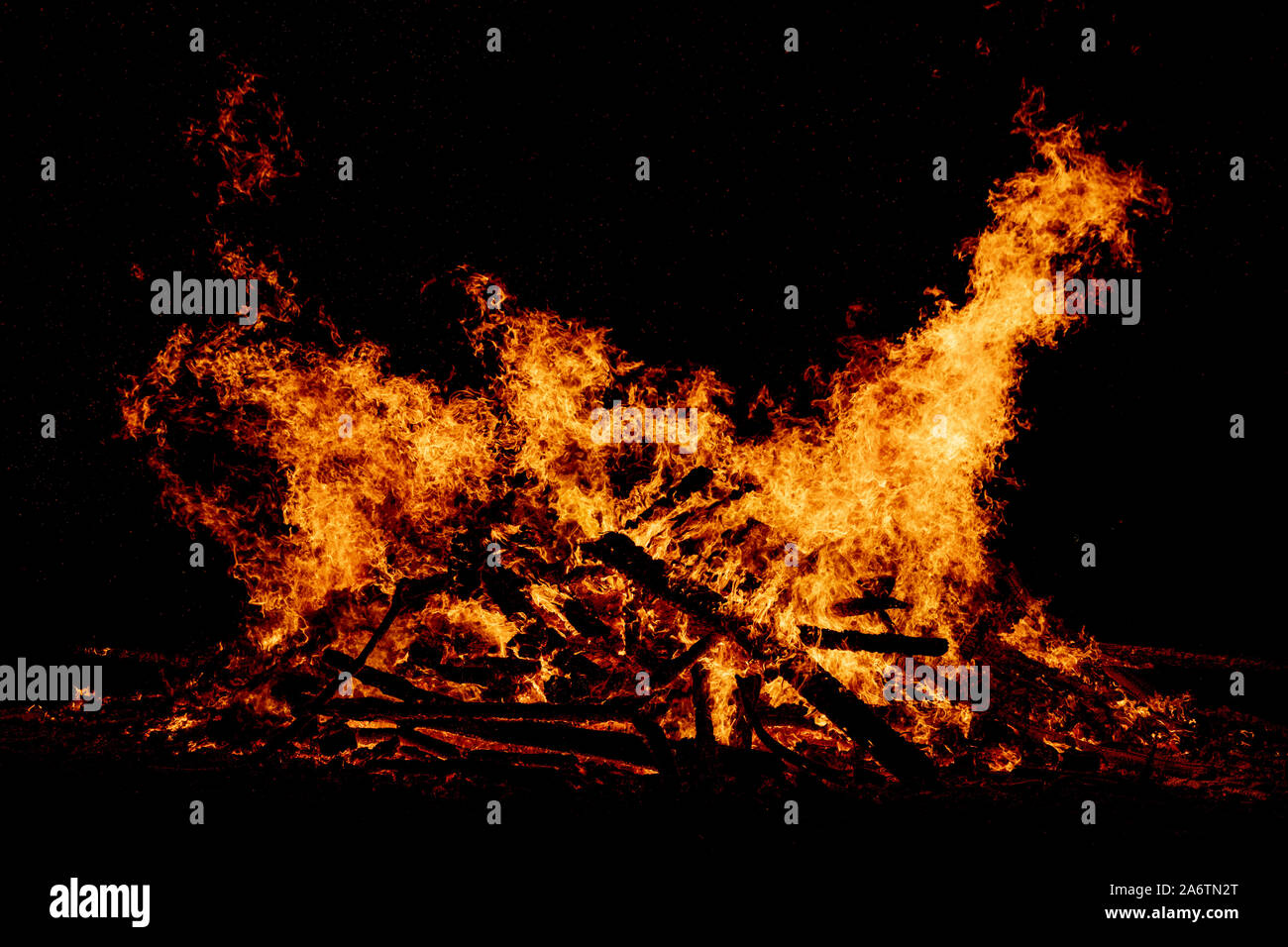 Fire burning at night Stock Photo - Alamy