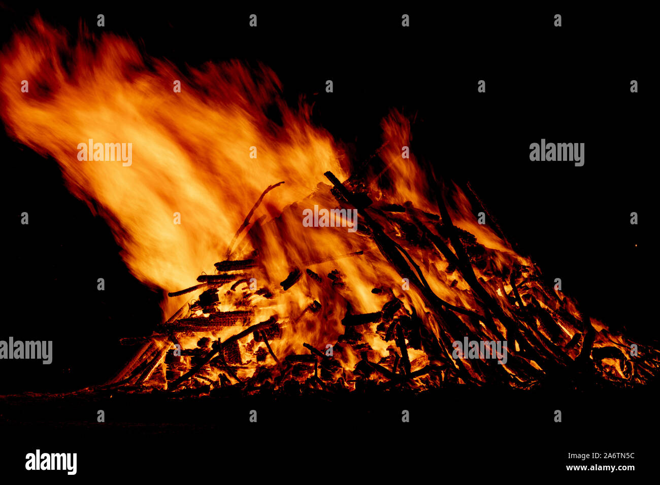 Fire burning at night Stock Photo - Alamy