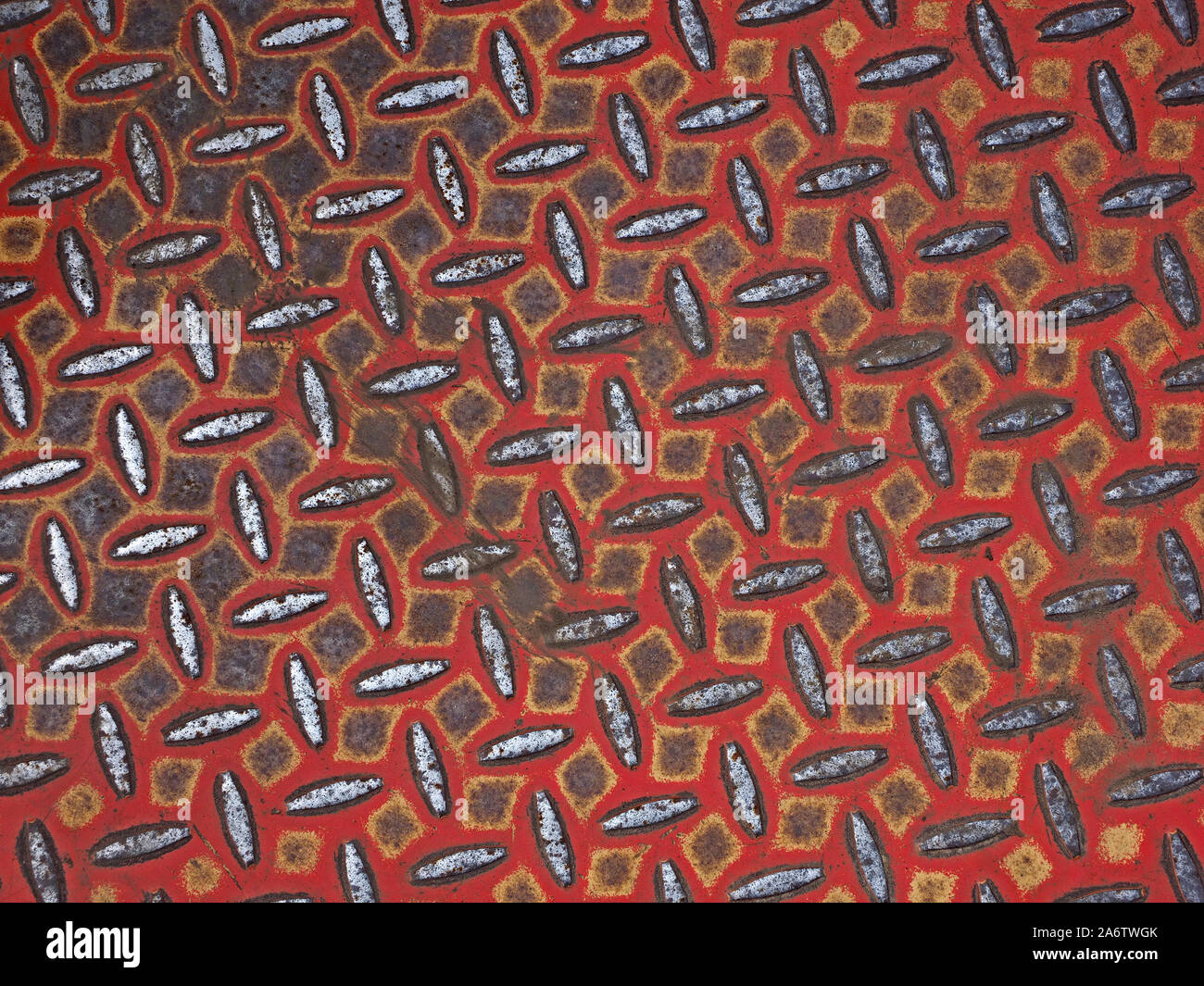 bright symmetrical pattern of steel plate with shiny ellipsoid raised ...