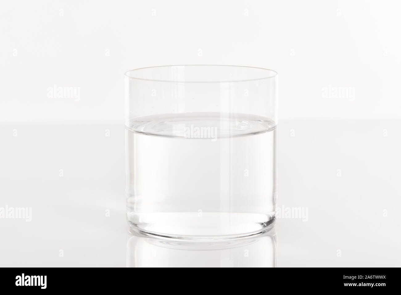 clear fresh water in transparent glass isolated on white Stock Photo ...