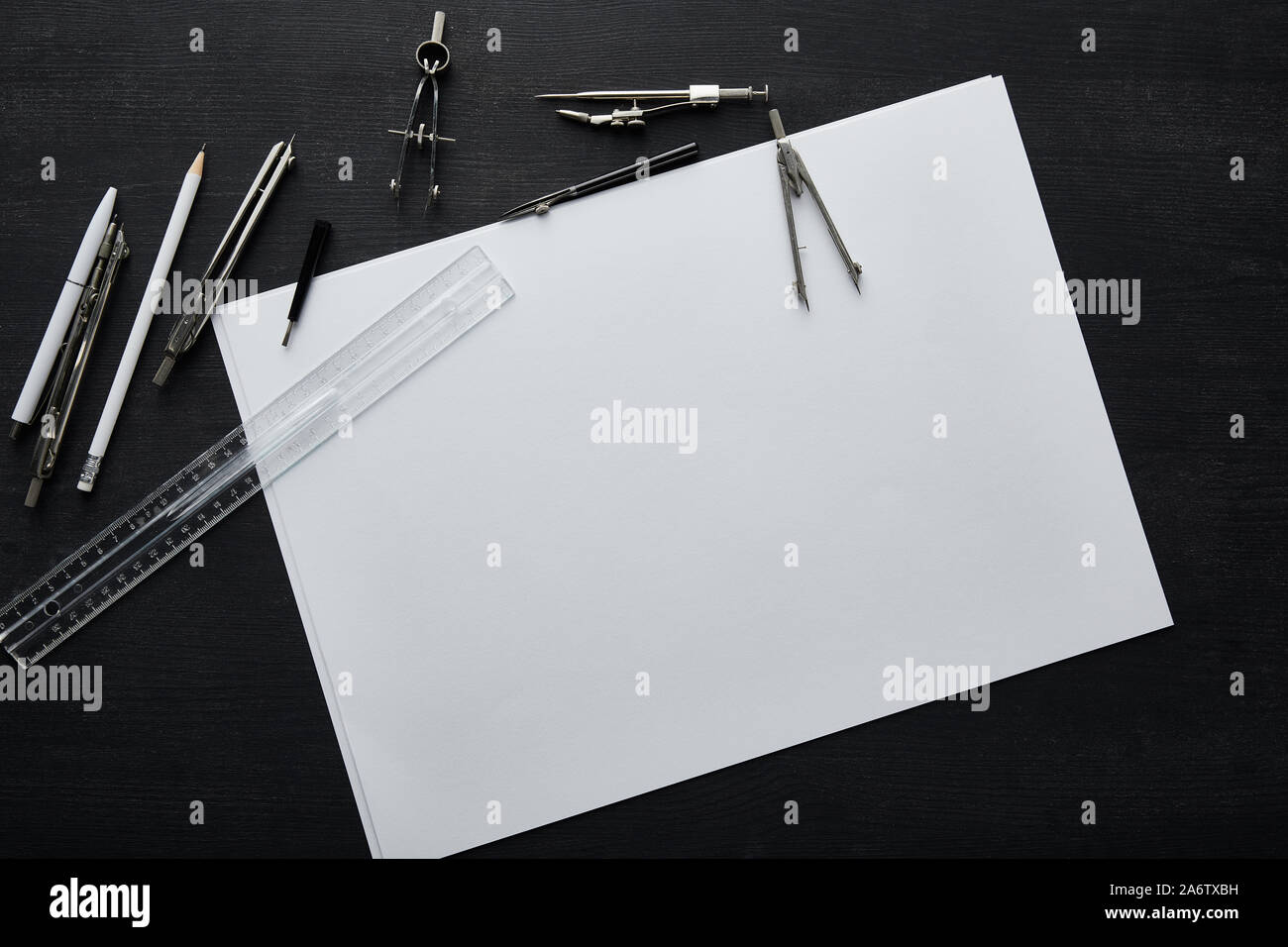 top view of paper, smartphone, pencil, pen, ruler and compasses Stock ...