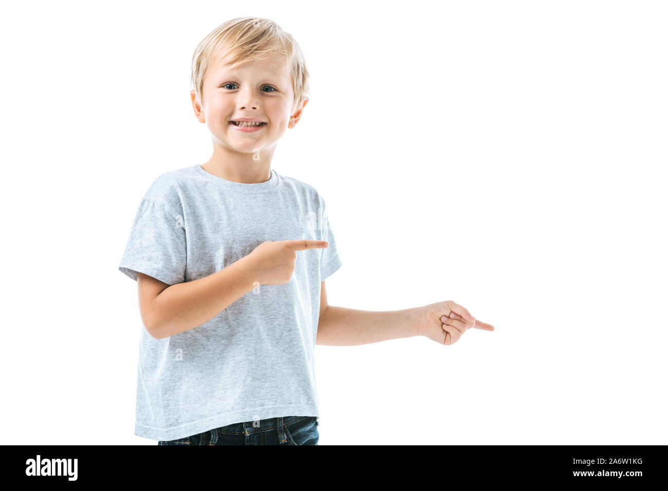 cheerful boy pointing with fingers isolated on white Stock Photo - Alamy