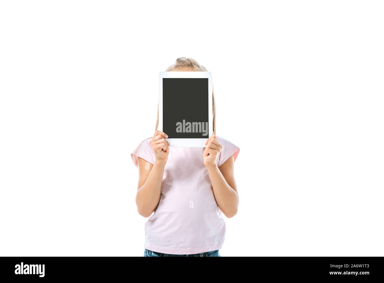 kid covering face while holding digital tablet with blank screen ...