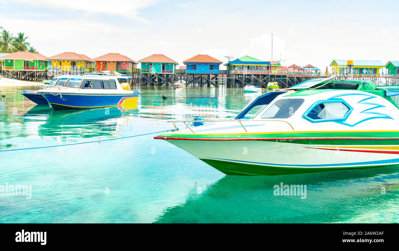 beautiful and colorful cottages at Derawan Island Resort, Borneo ...