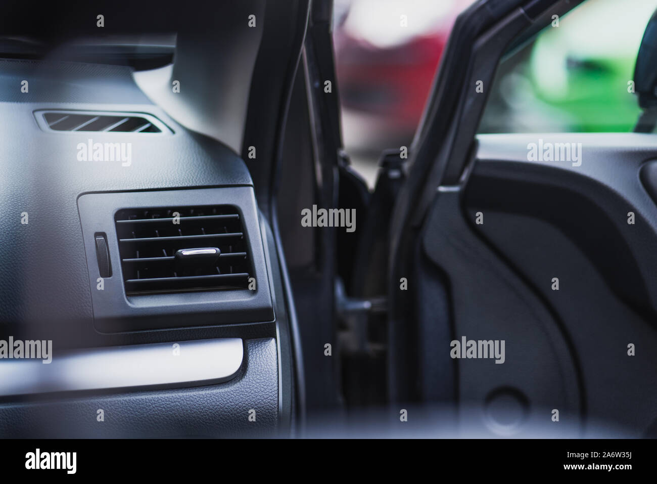 selective focus of car interior with open front door Stock Photo - Alamy