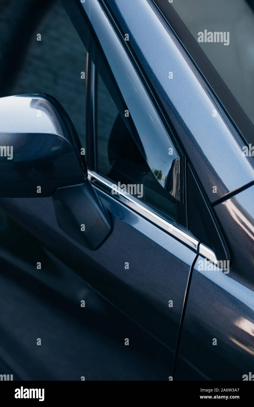 part of front right front side of black modern car Stock Photo - Alamy