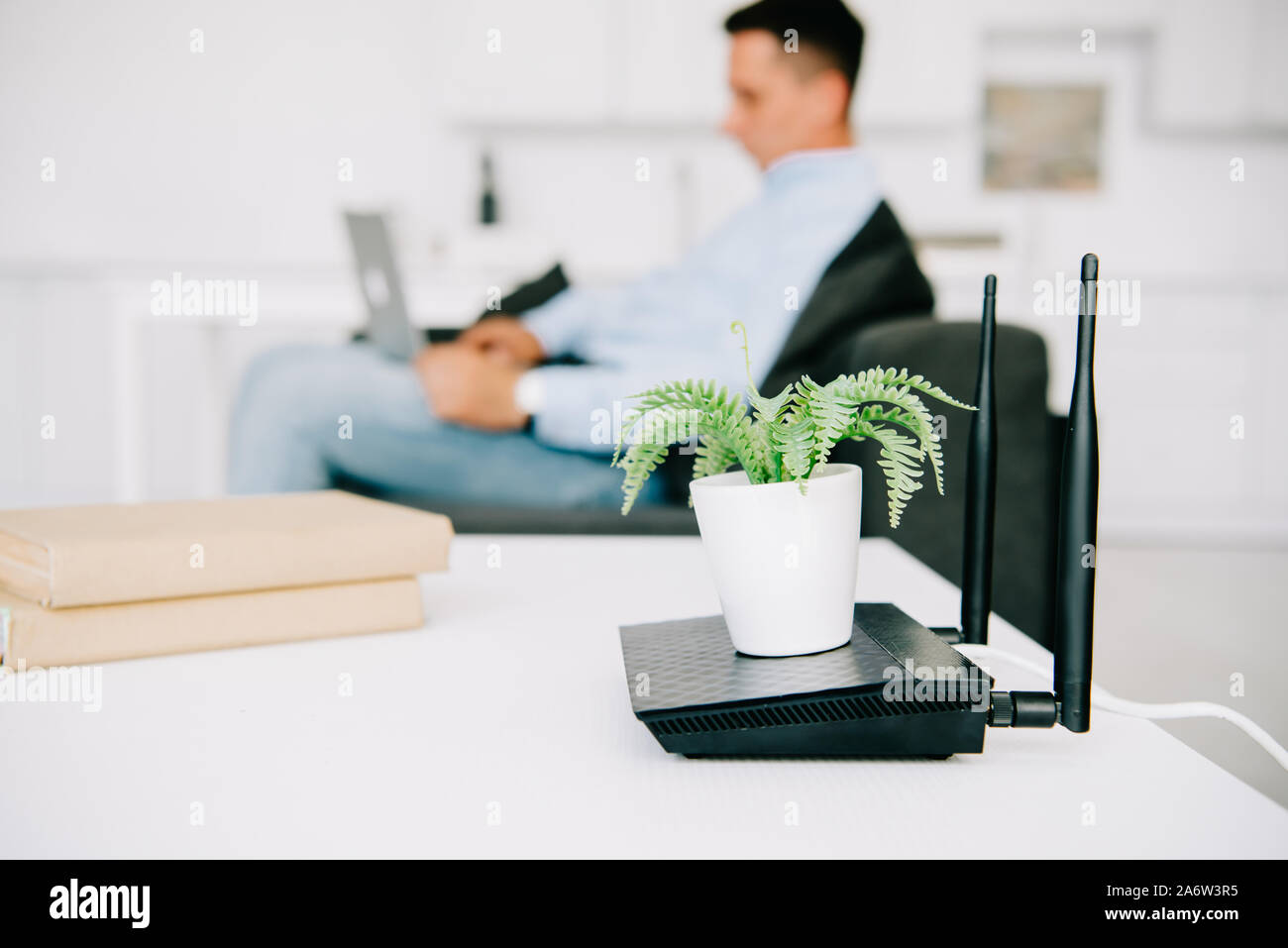 Using wifi router hi-res stock photography and images - Alamy