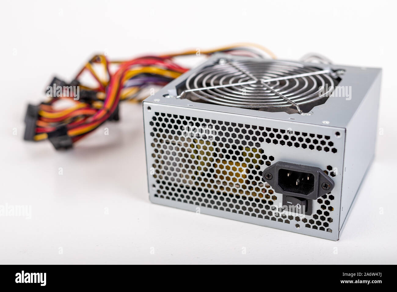 Computer power supply with cables and plugs. Desktop accessories. Light ...