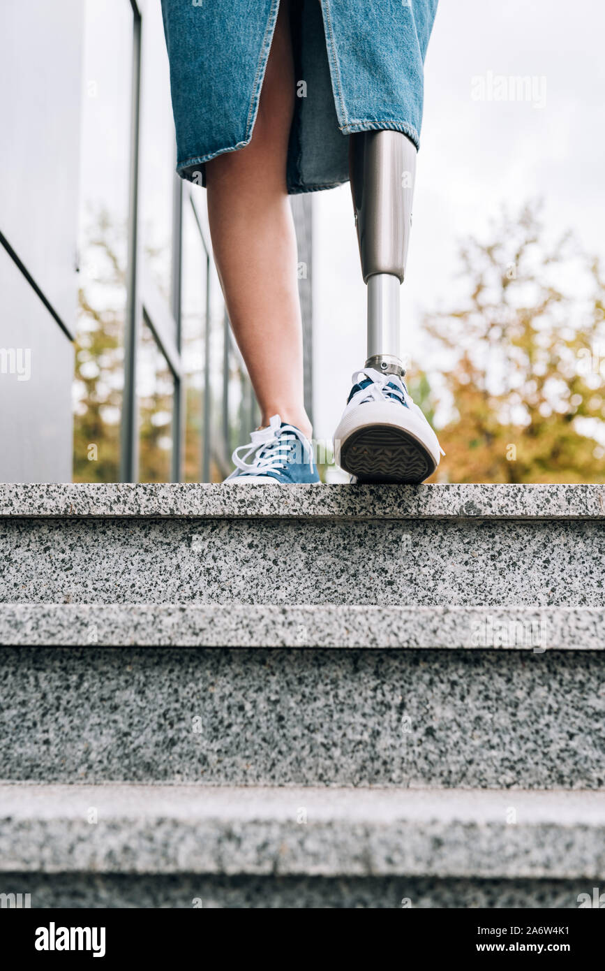 cropped view of disabled woman with prosthetic leg on street Stock ...