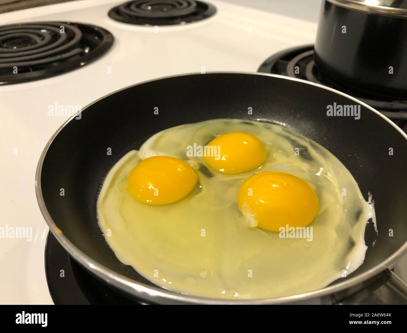 Happy face frying eggs hi-res stock photography and images - Alamy