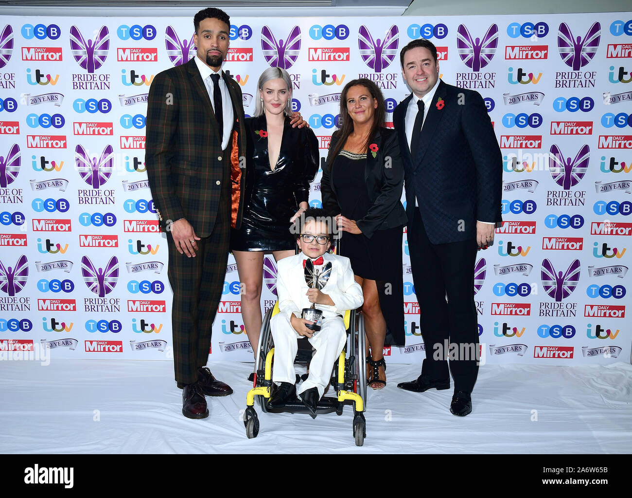 Dante Marvin with his Child of Courage award poses with Ashley Banjo ...